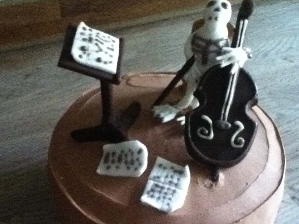 Skeleton playing a double bass - The Great British Bake Off